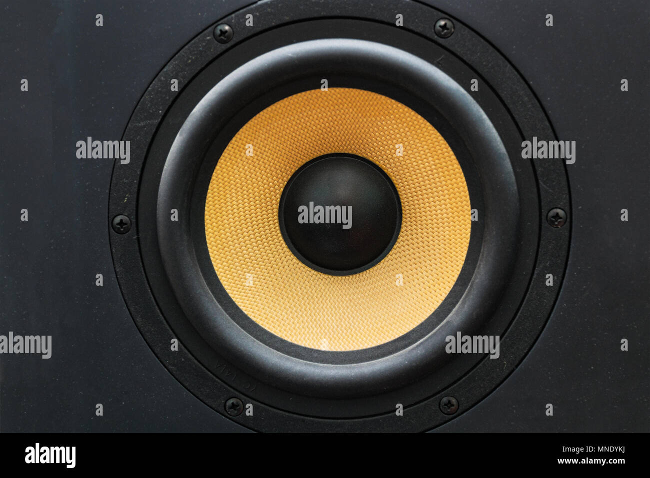 Speaker loudspeaker with yellow diffuser Stock Photo - Alamy