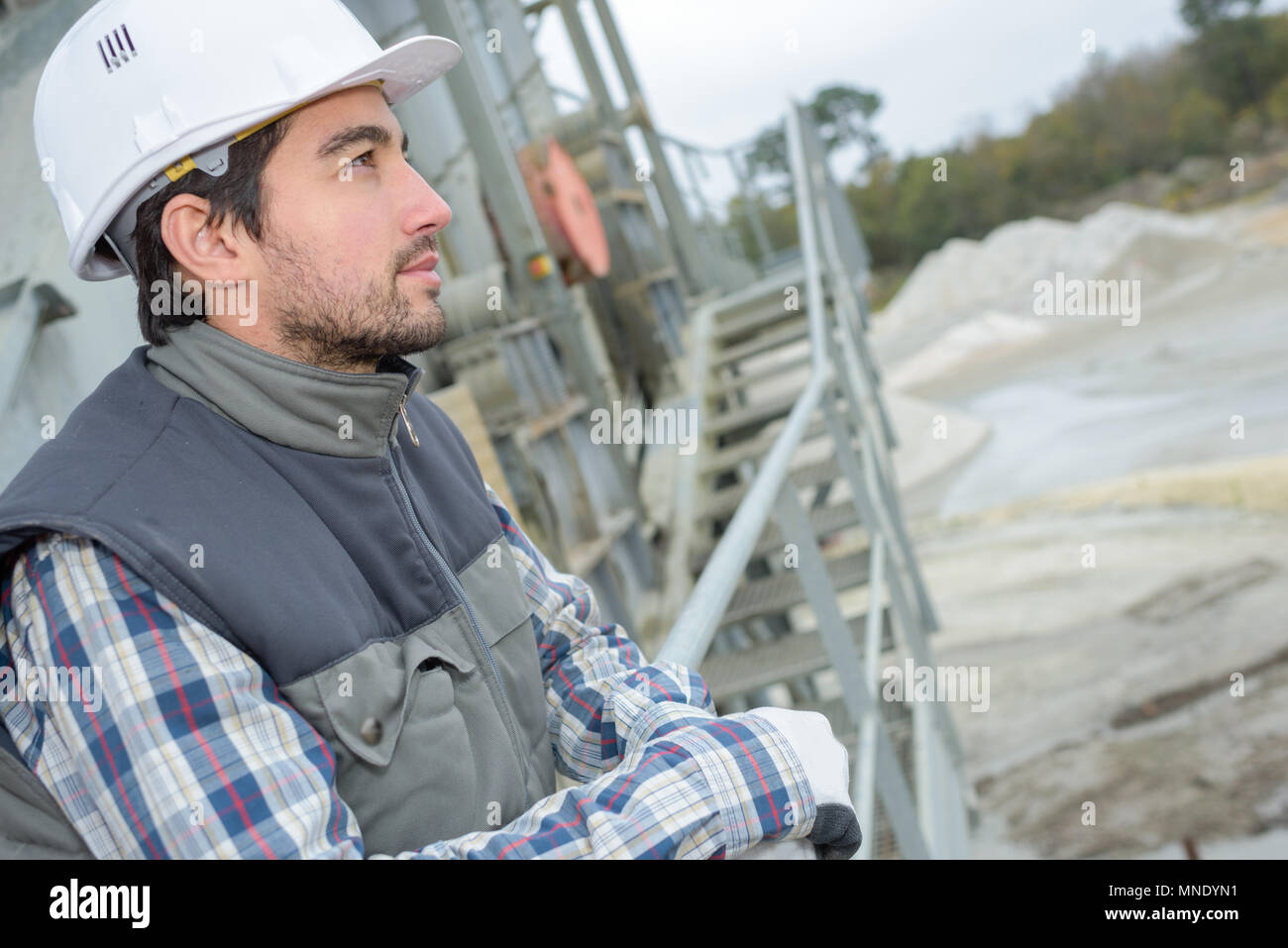 engineer looking outside the factory Stock Photo - Alamy