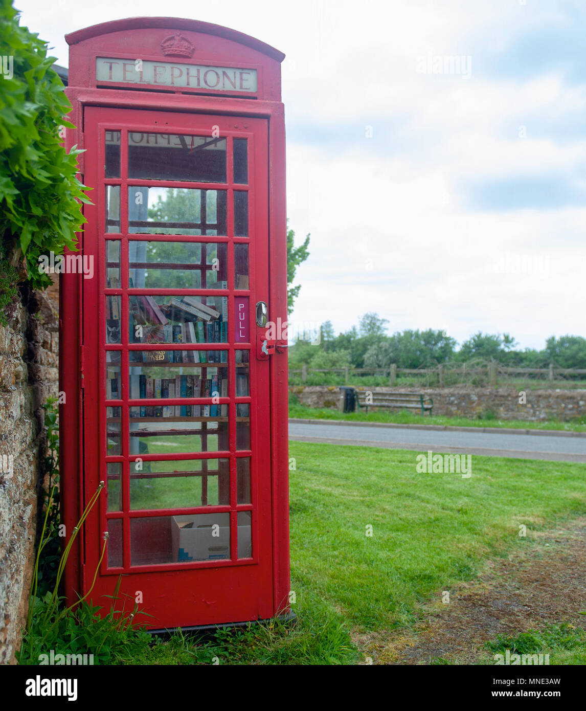 Leicestershire, UK. 16th May 2018. An old telephone box is used as a ...