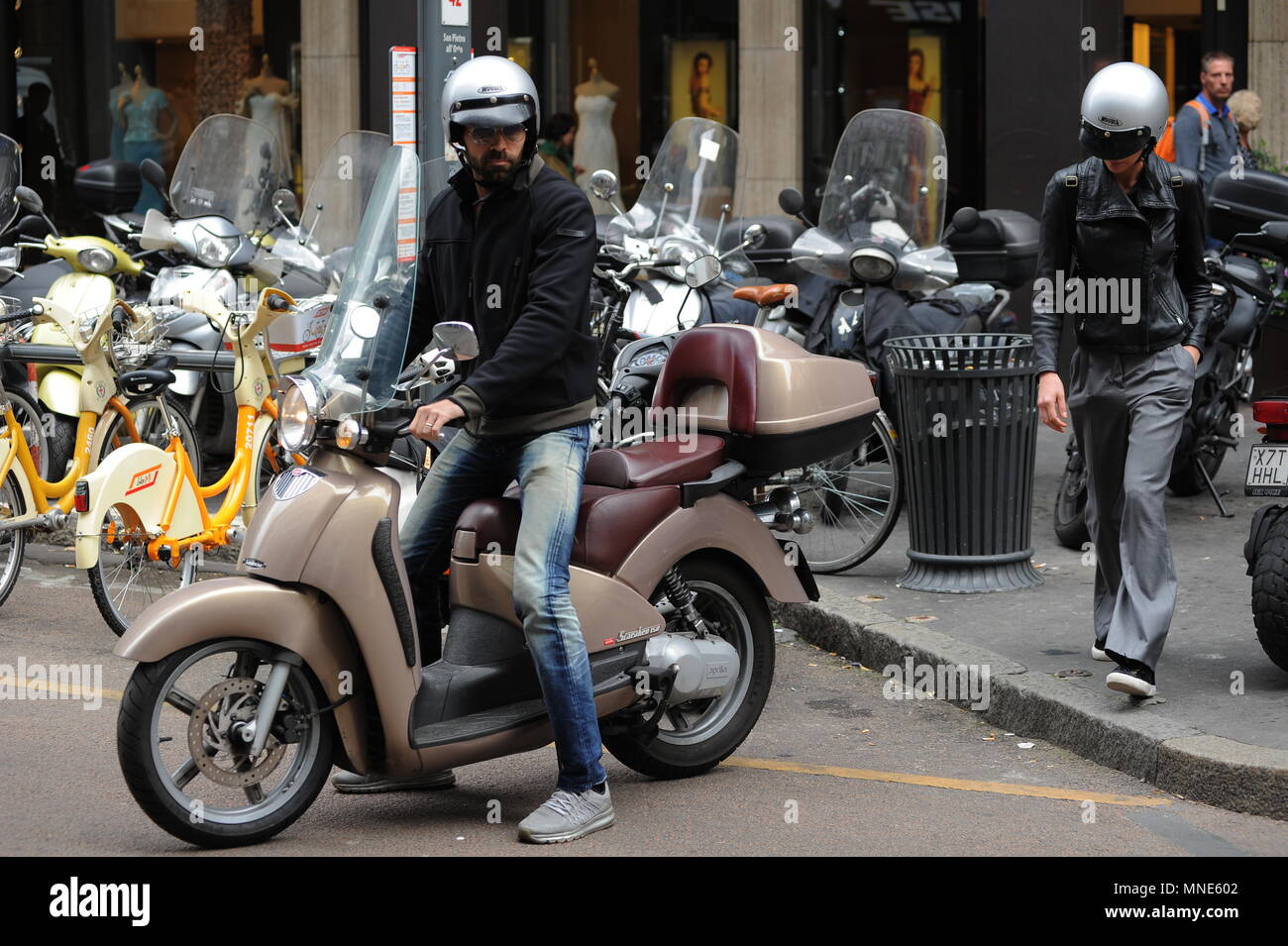 Milan, Simone Giancola and Veridiana Malmann on the motorbike Former ...