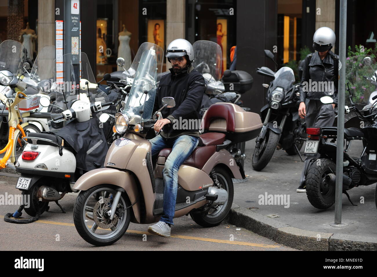 Milan, Simone Giancola and Veridiana Malmann on the motorbike Former ...