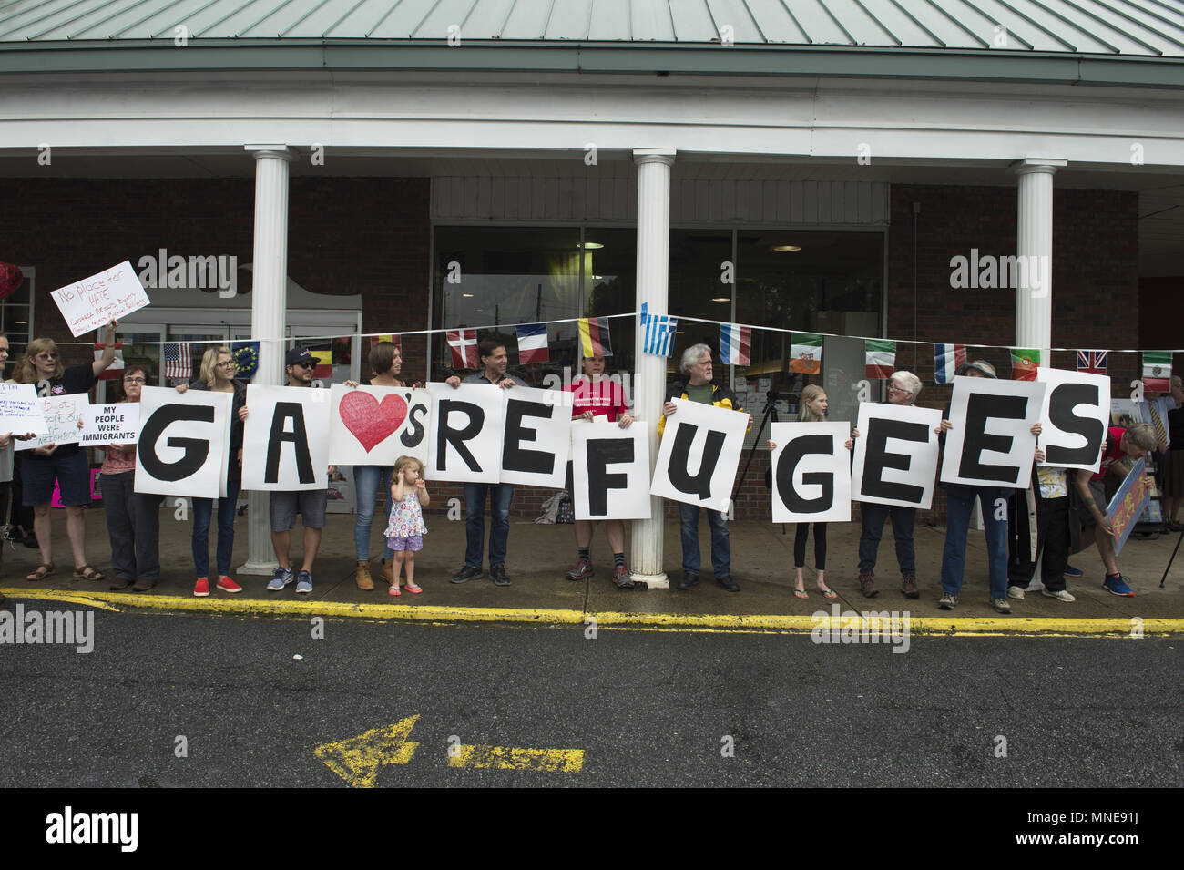 May 16, 2018 - Clarkston, GA - Scores of protesters swarm Georgia ...