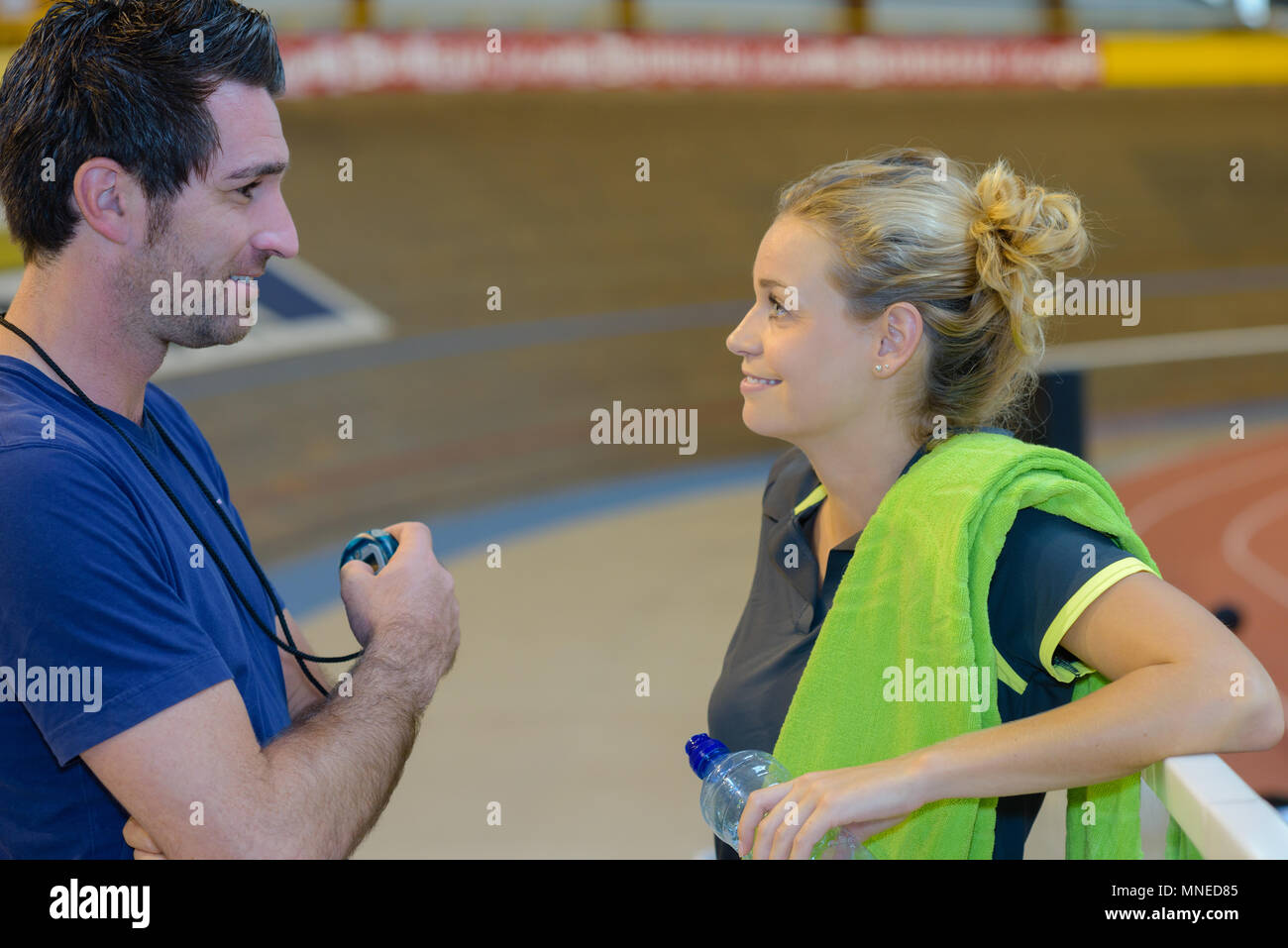 conversation with coach and athlete Stock Photo - Alamy