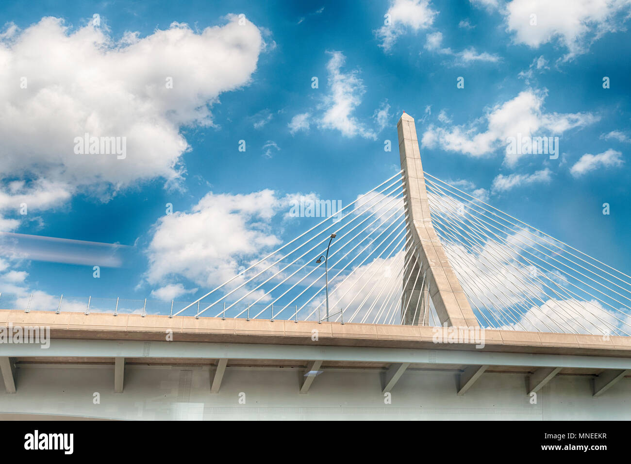 Looking up at Bunker Hill Memorial Bridge from inside a train in Boston ...