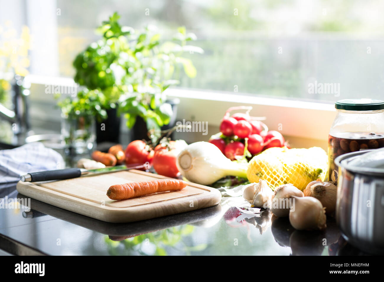Home cooking vegetables in a modern kitchen Stock Photo - Alamy