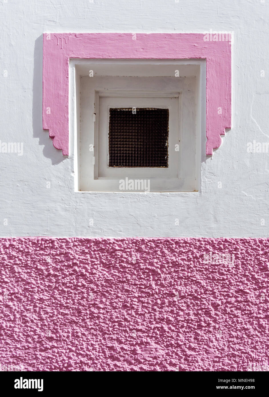 Small square window in moroccan style pink painted Stock Photo - Alamy