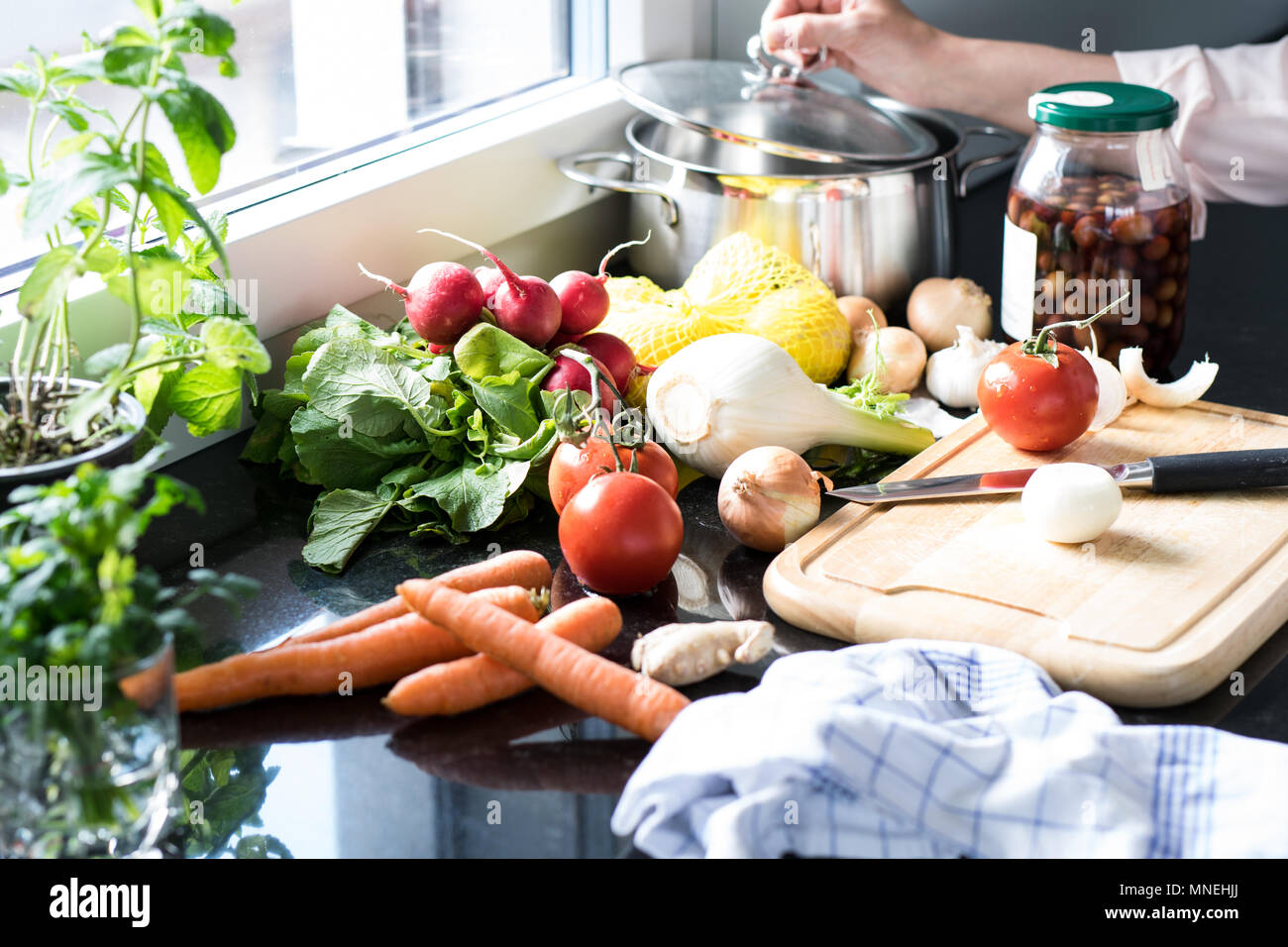 Home cooking vegetables in a modern kitchen Stock Photo - Alamy