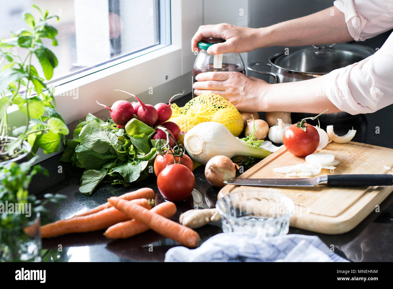 Home cooking vegetables in a modern kitchen Stock Photo - Alamy
