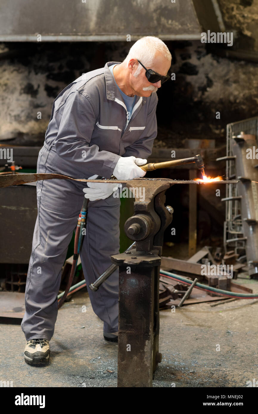 Man doing welding work welder hi-res stock photography and images - Alamy