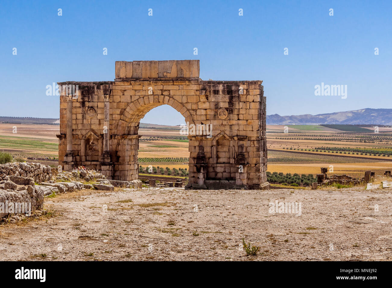 The Arch of Caracalla, the entrance gate of Volubilis site near Fez and ...