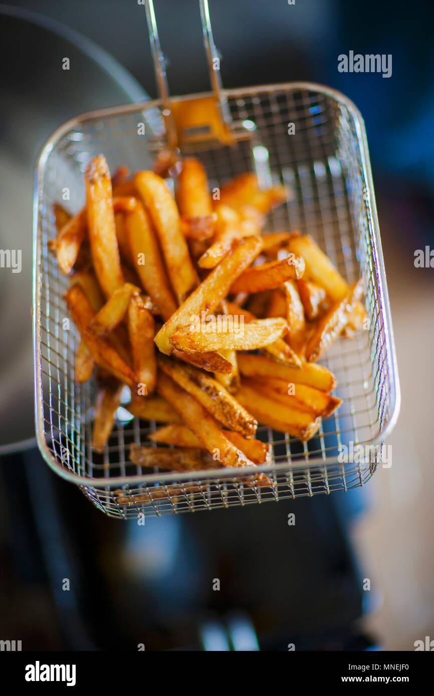 Potato chips dripping hi-res stock photography and images - Alamy
