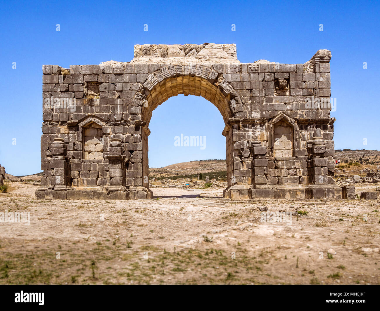 The Arch of Caracalla, the entrance gate of Volubilis site near Fez and ...
