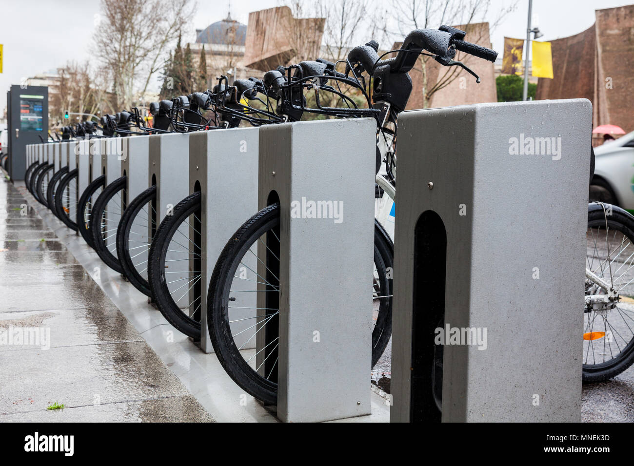Public bike rental station Stock Photo - Alamy