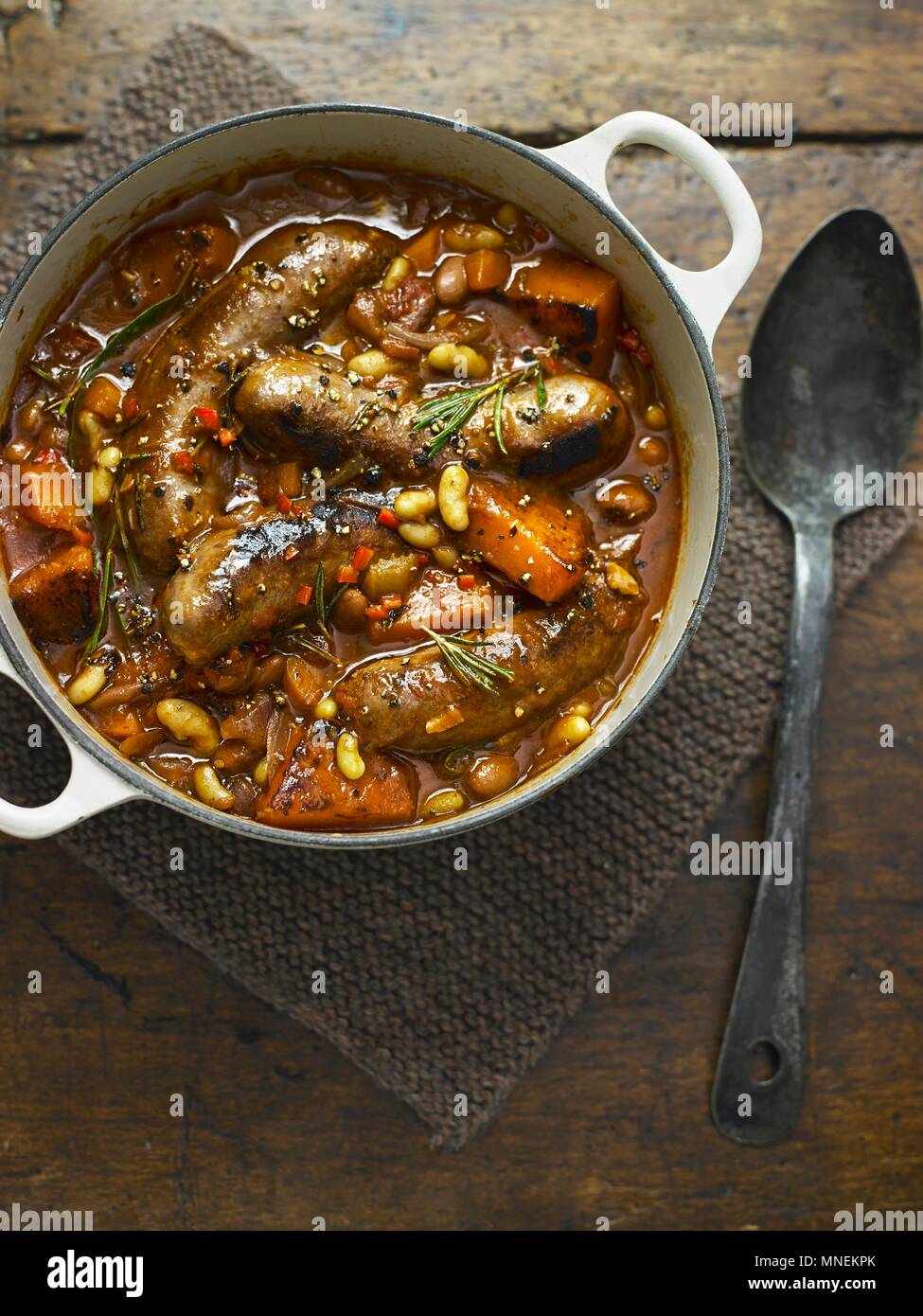 Sausage and bean stew with garlic and chilli Stock Photo - Alamy