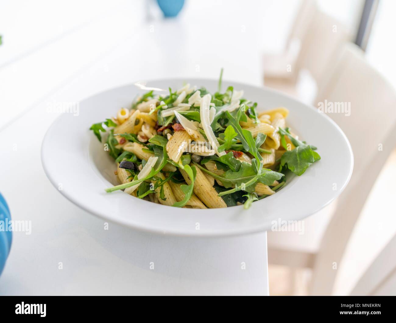 Pasta salad with rockets, dried tomatoes and Parmesan cheese Stock ...