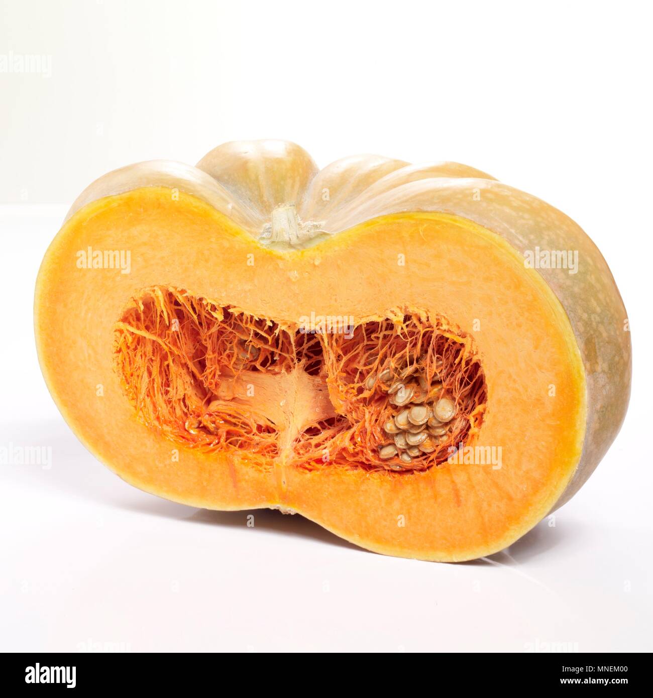 A Muscat pumpkin cut in half Stock Photo - Alamy