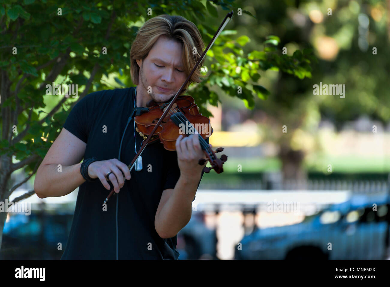 Boston, Massachusetts, USA - September 12, 2016: A male violinist play ...