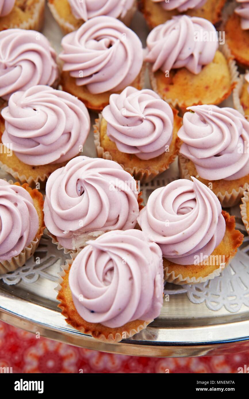 Mini Cupcakes with Blueberry Frosting Stock Photo - Alamy