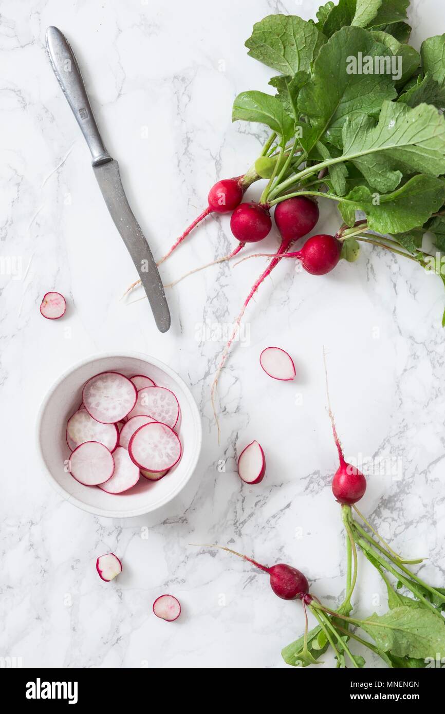 Whole sliced fresh radishes hi-res stock photography and images - Alamy