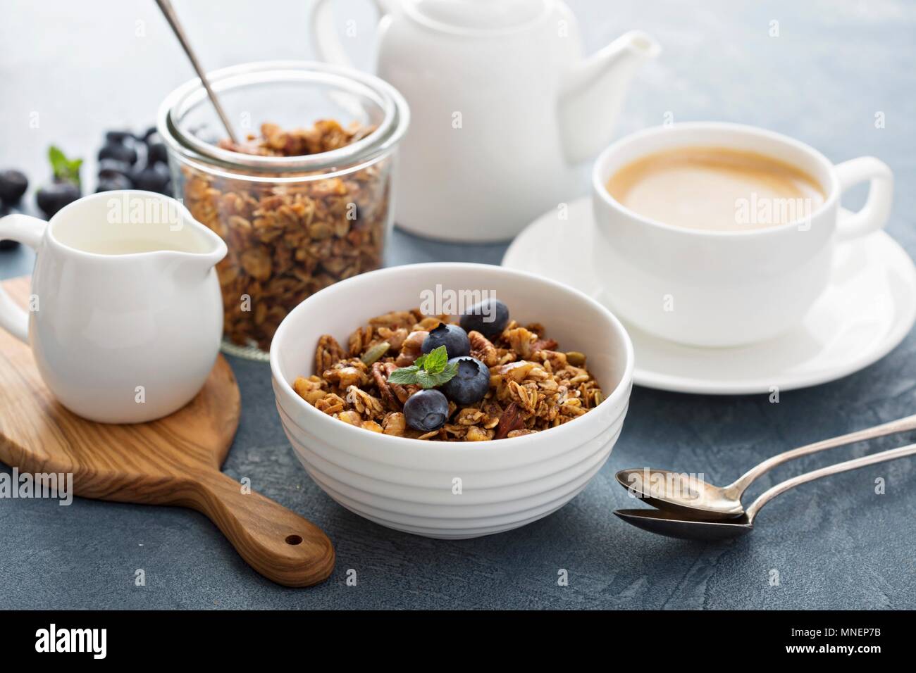 Homemade muesli with milk for breakfast served with coffee Stock Photo ...