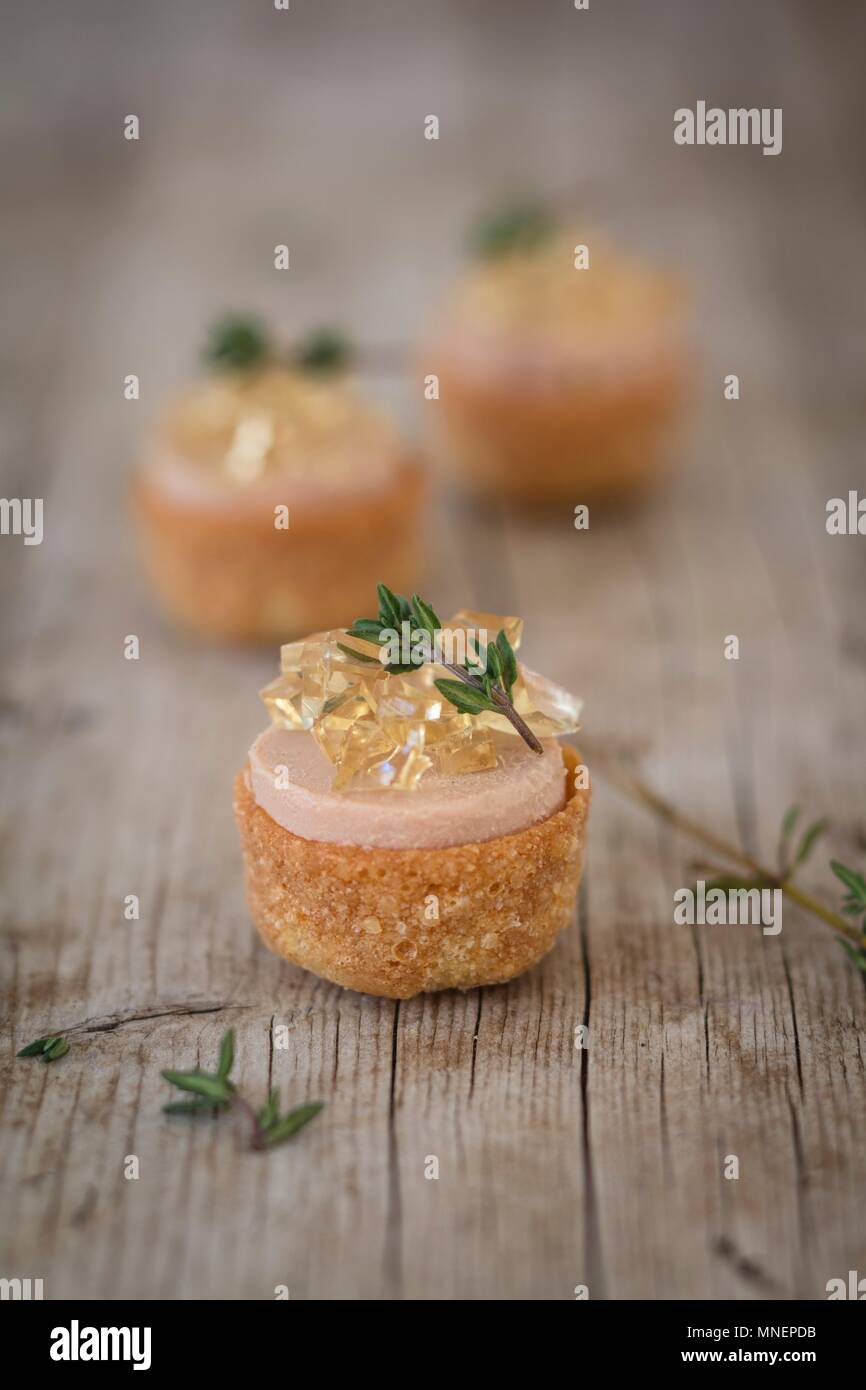 Croustades with goose liver and jelly Stock Photo - Alamy