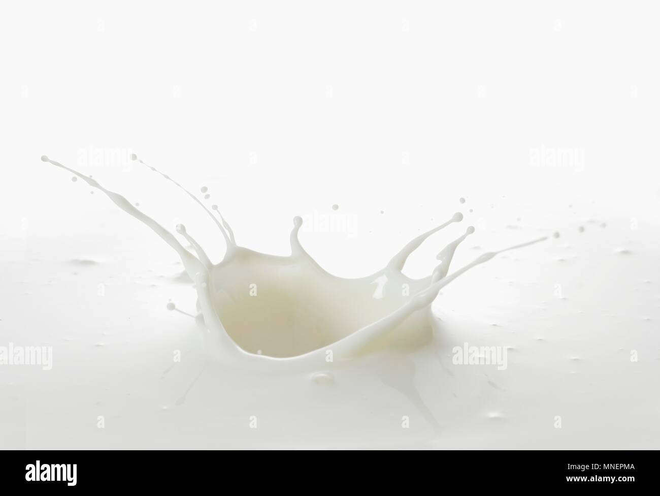 Splash of milk Stock Photo - Alamy