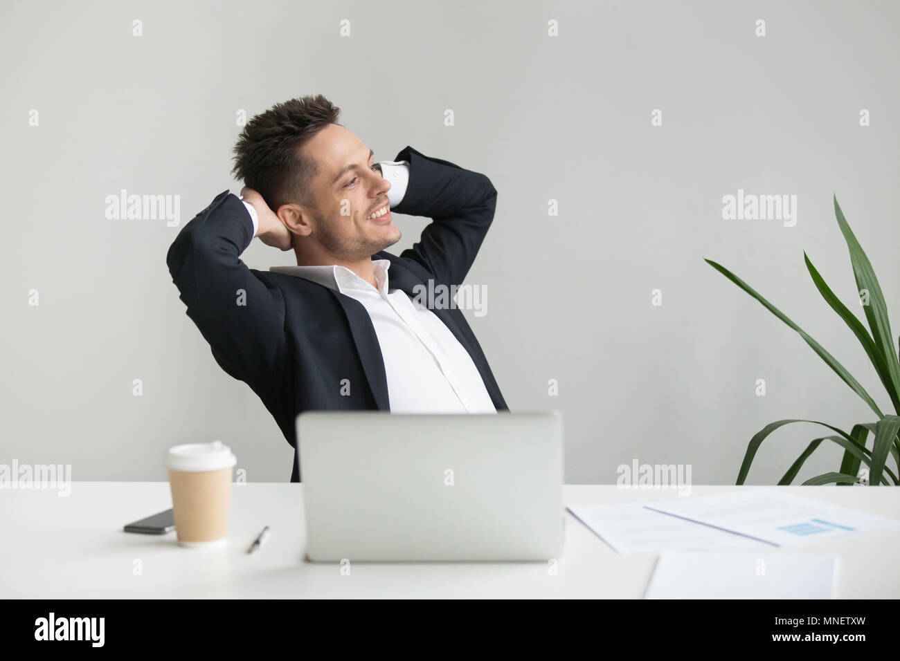 Man Leaning Back In Chair High Resolution Stock Photography and Images ...