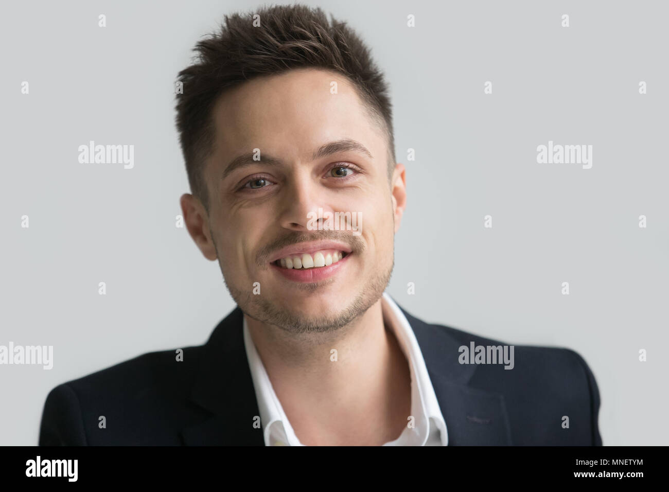 Handsome businessman smiling camera caucasian hi-res stock photography ...