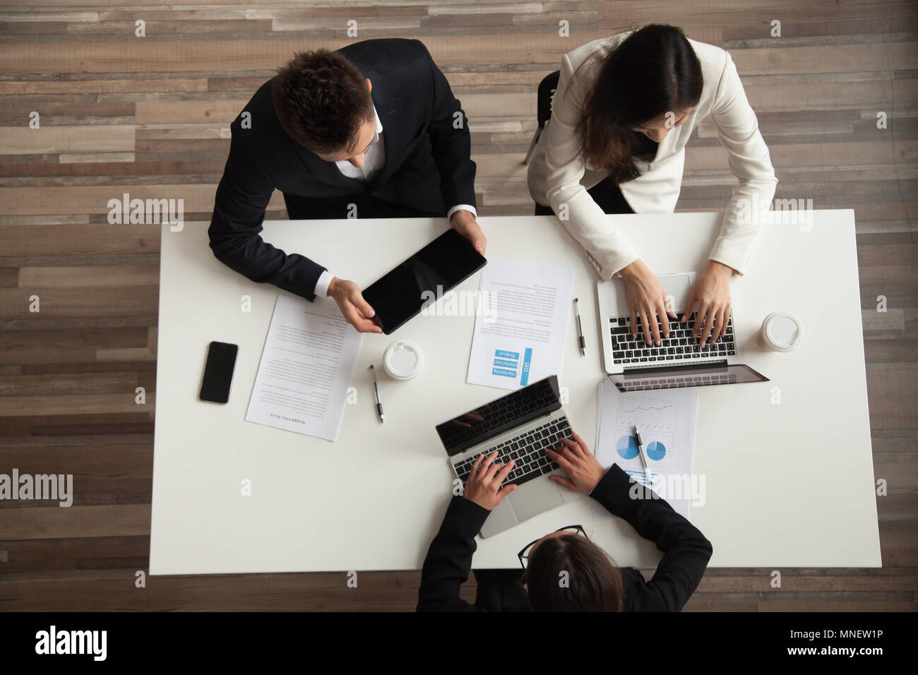 Business team working above view hi-res stock photography and images ...