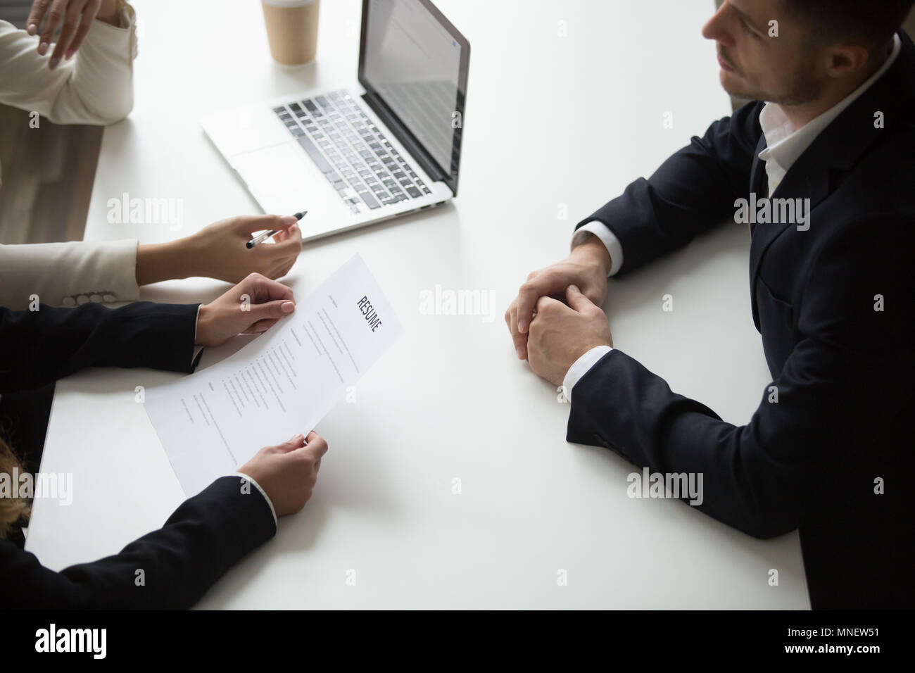 Confident job applicant having interview hi-res stock photography and images - Alamy