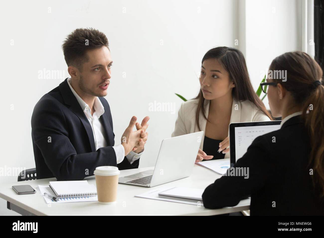 Adult caucasian millennial employee sharing hi-res stock photography ...