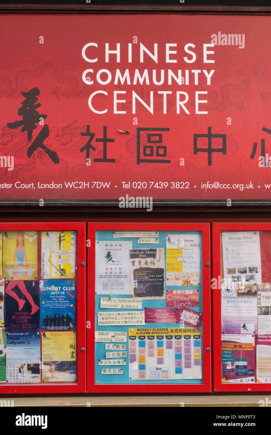 advertisements on a notice board in china town leicester square in ...