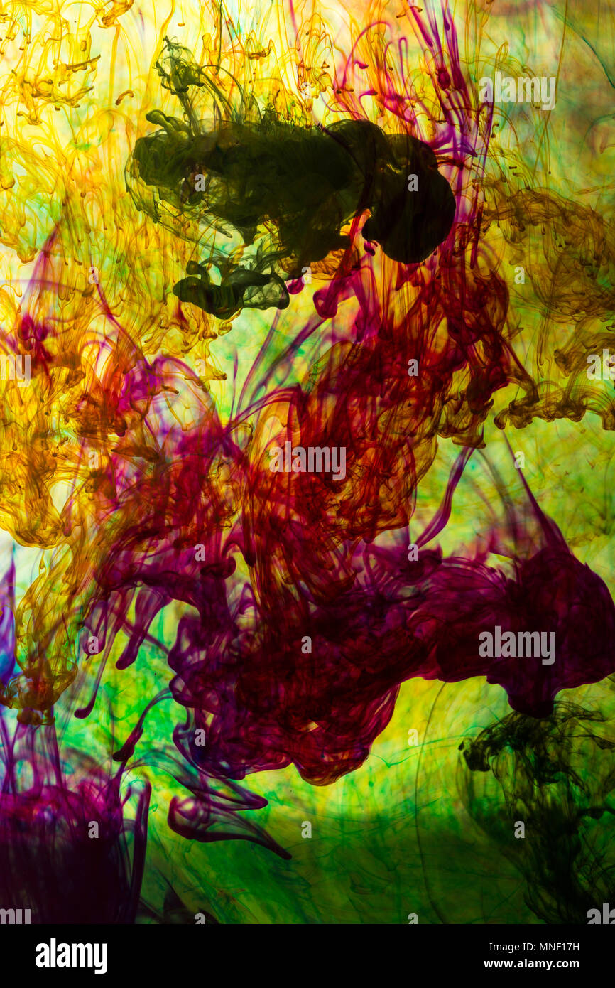Acrylic colors and ink in water. Abstract background Stock Photo - Alamy