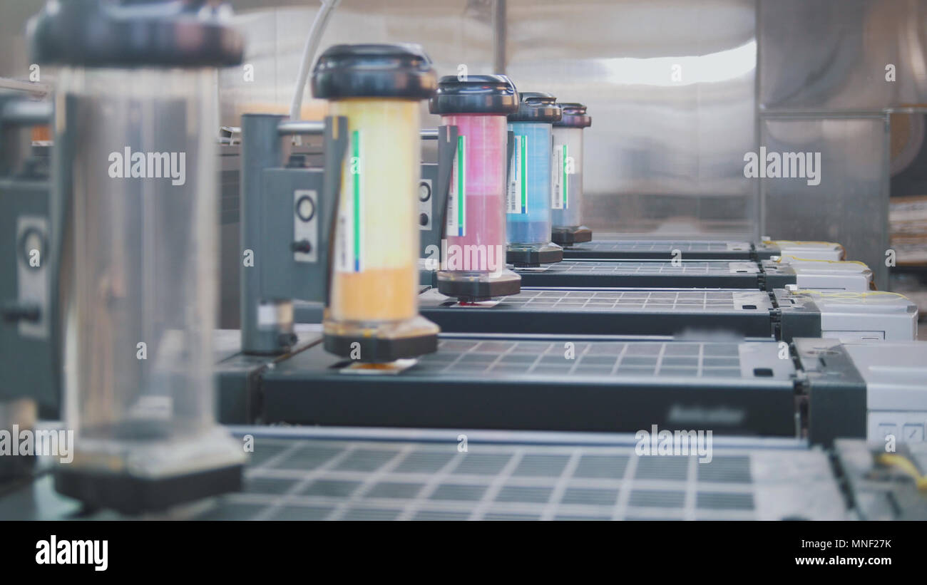 Containers with paints for printing press in the typography Stock Photo ...