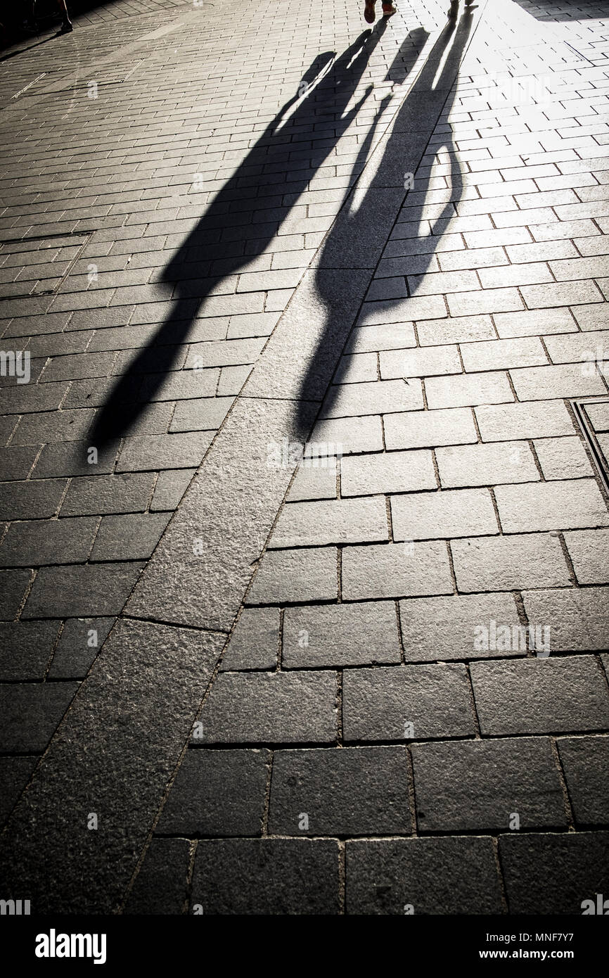 Shadows of pedestrians on pavement, Toulouse, France Stock Photo - Alamy