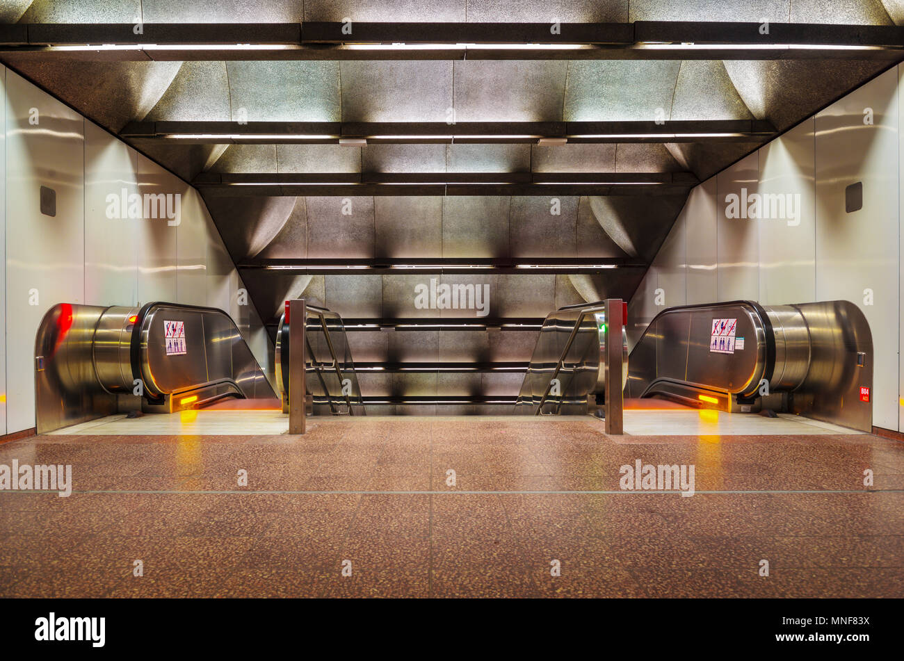 Access with escalators to the platform, underground station ...