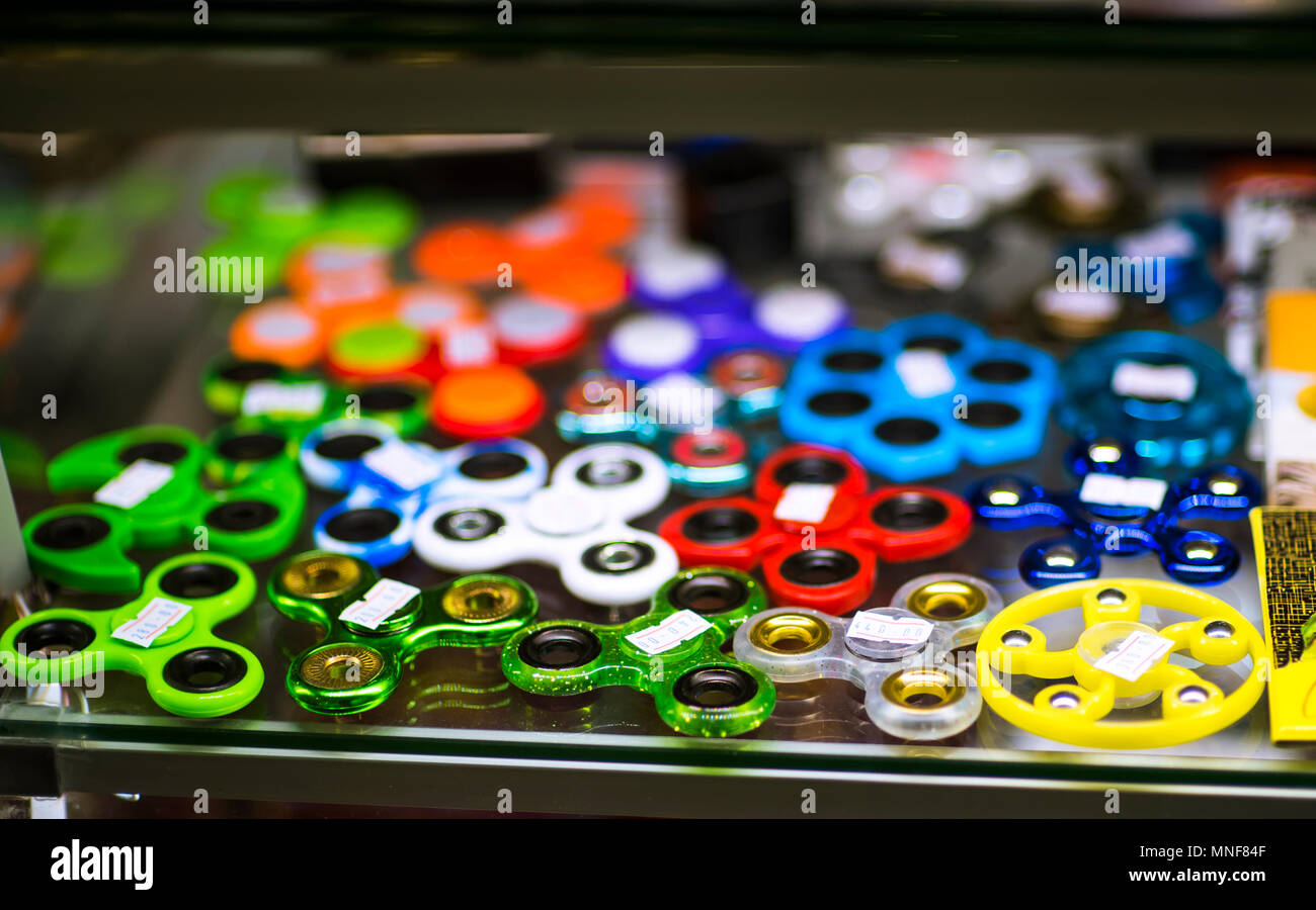 Hand spinners or fidgeting spinners. Many types and shapes of spinners ...