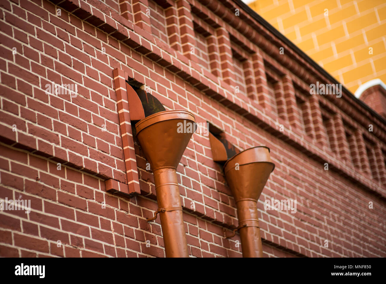 image of vintage Roof gutter pipe line after rain with water drainage ...