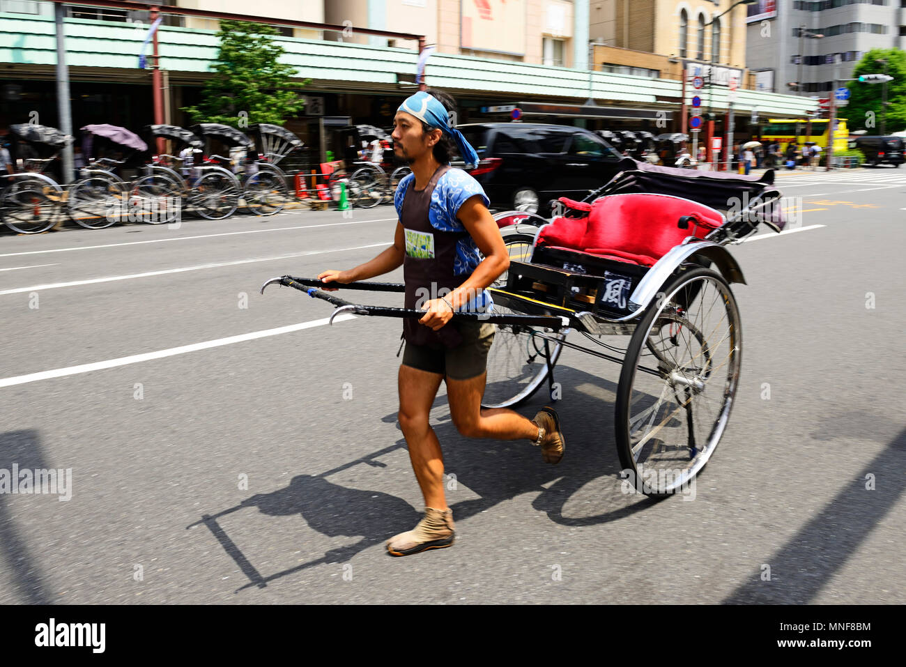 Rickshaw with Runner, Asakusa Quarter, Tokyo, Japan Stock Photo - Alamy