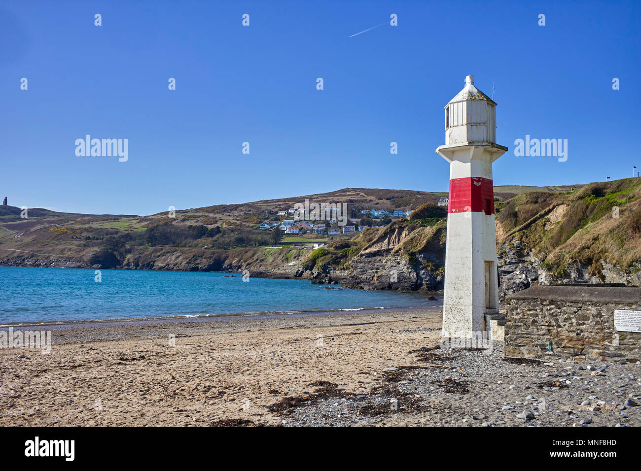 The lighthouse beacon on the beach at Port Erin in the Isle of Man ...