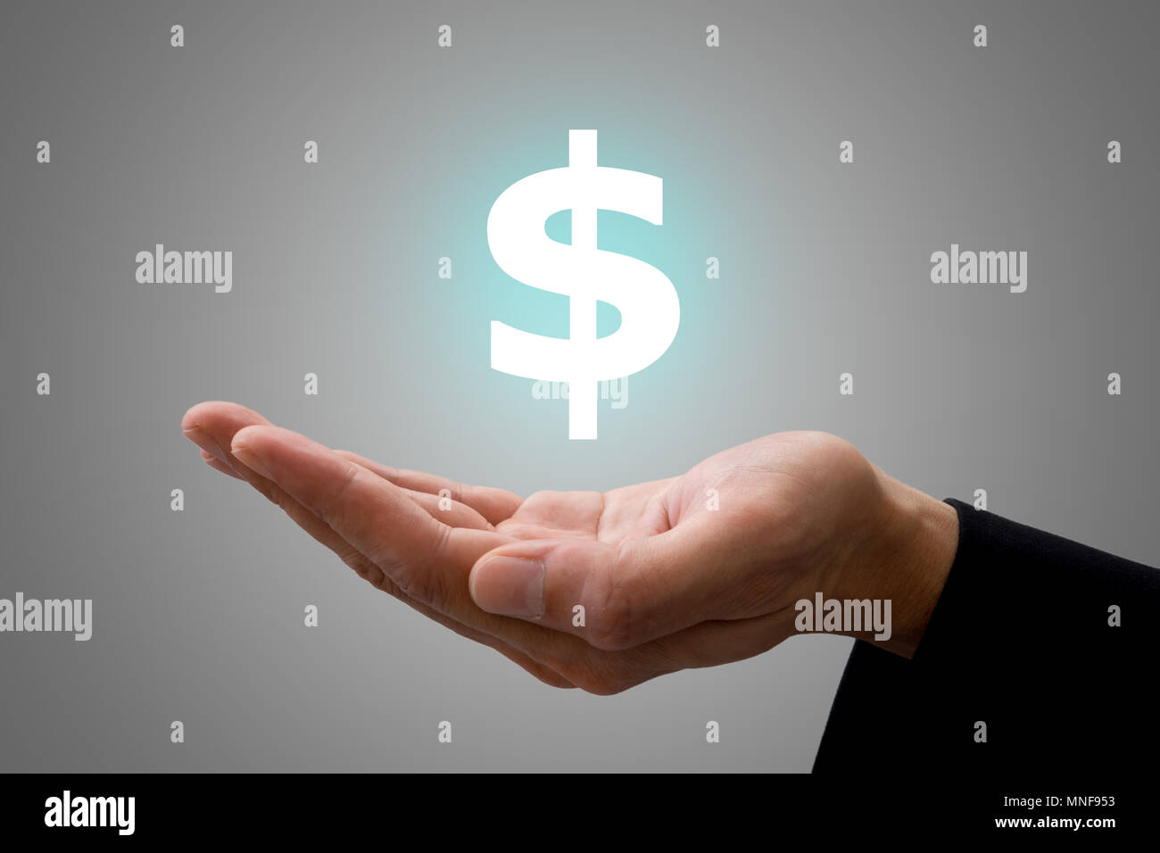 Businessman and the power of money on his hand Stock Photo - Alamy