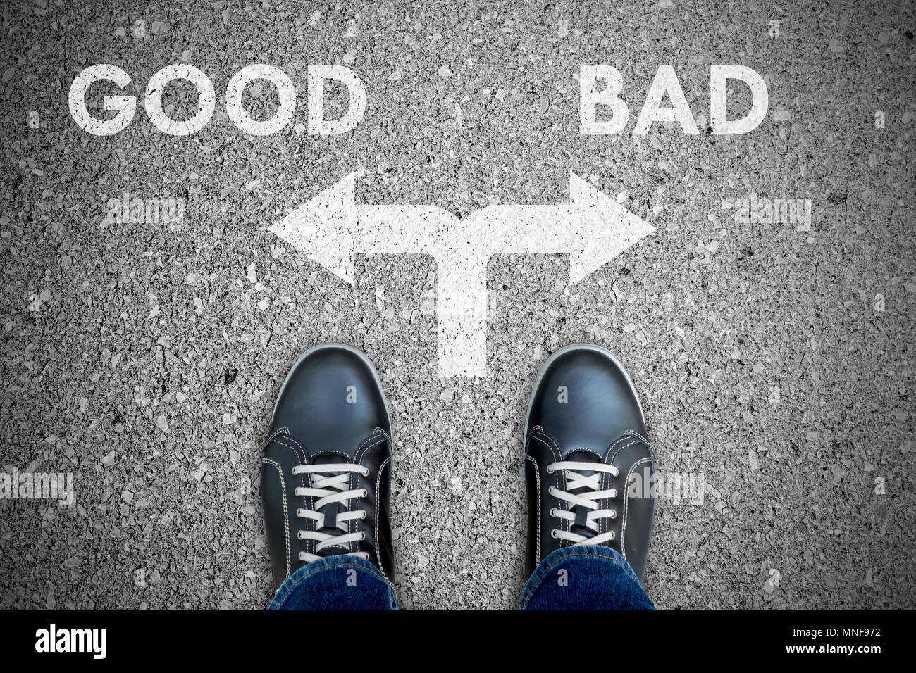 Black casual shoes standing at the crossroad making decision good or ...