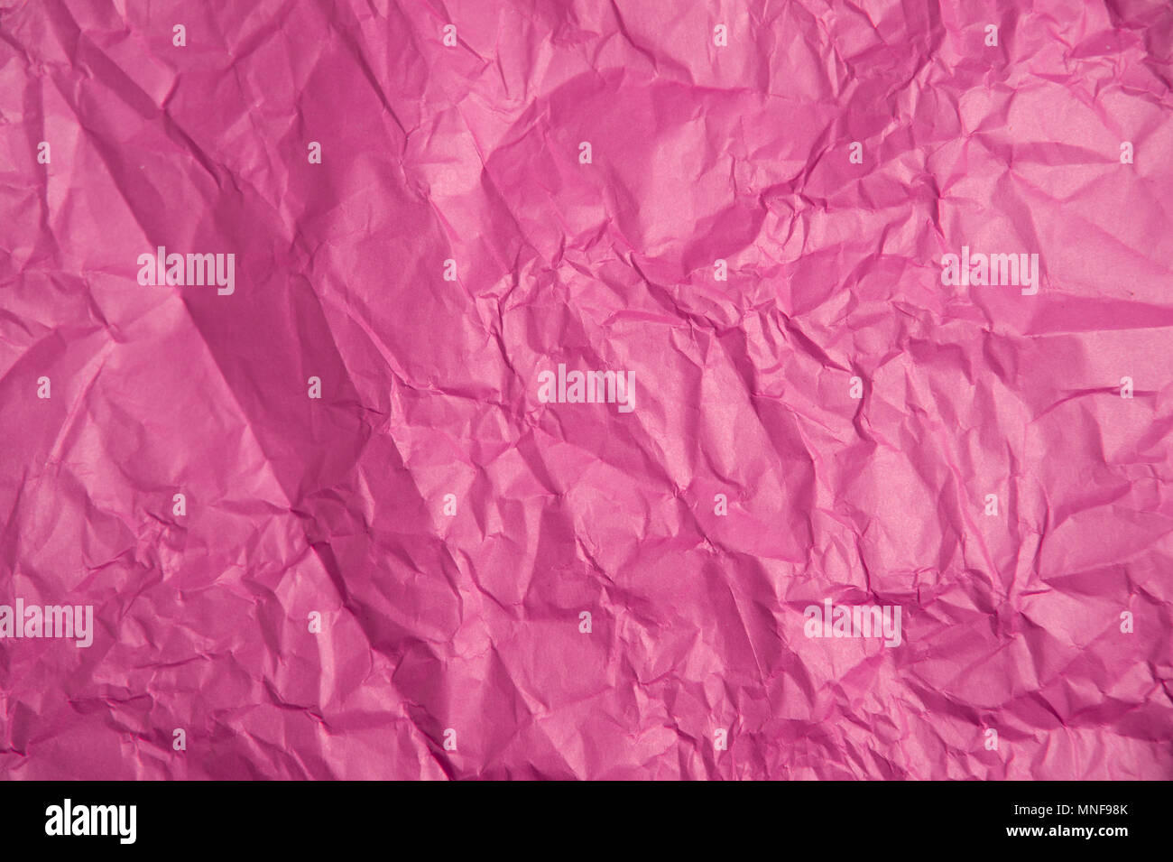Crumpled pink paper texture for background Stock Photo - Alamy