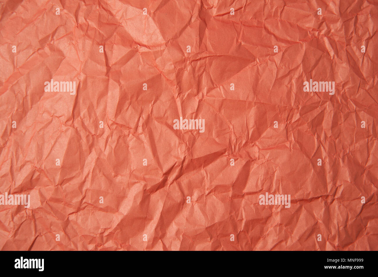 Crumpled orange paper texture for background Stock Photo - Alamy