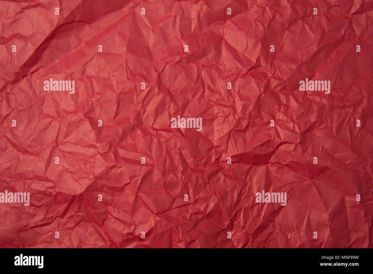 Crumpled red paper texture for background Stock Photo - Alamy