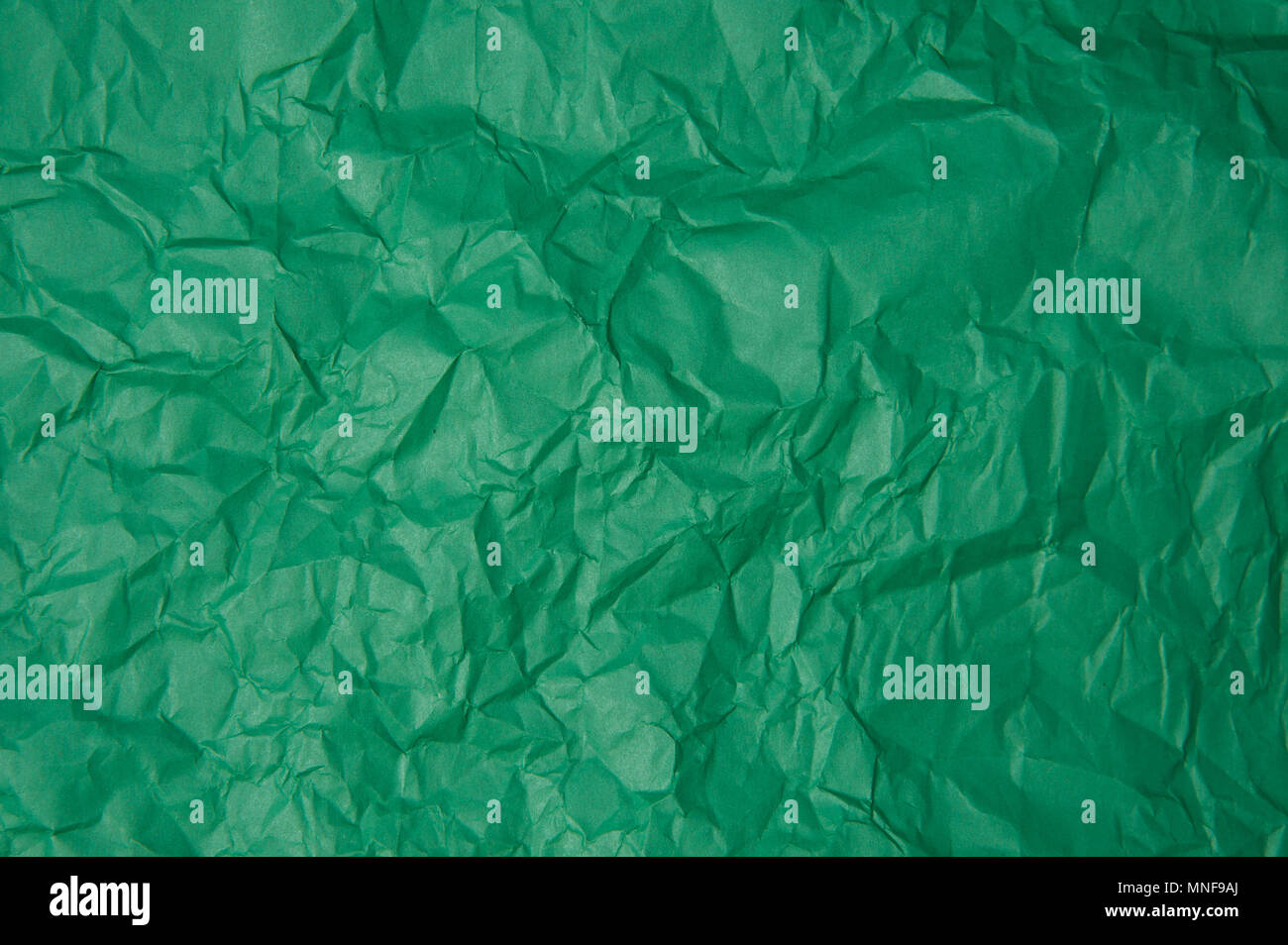 Crumpled green paper texture for background Stock Photo - Alamy