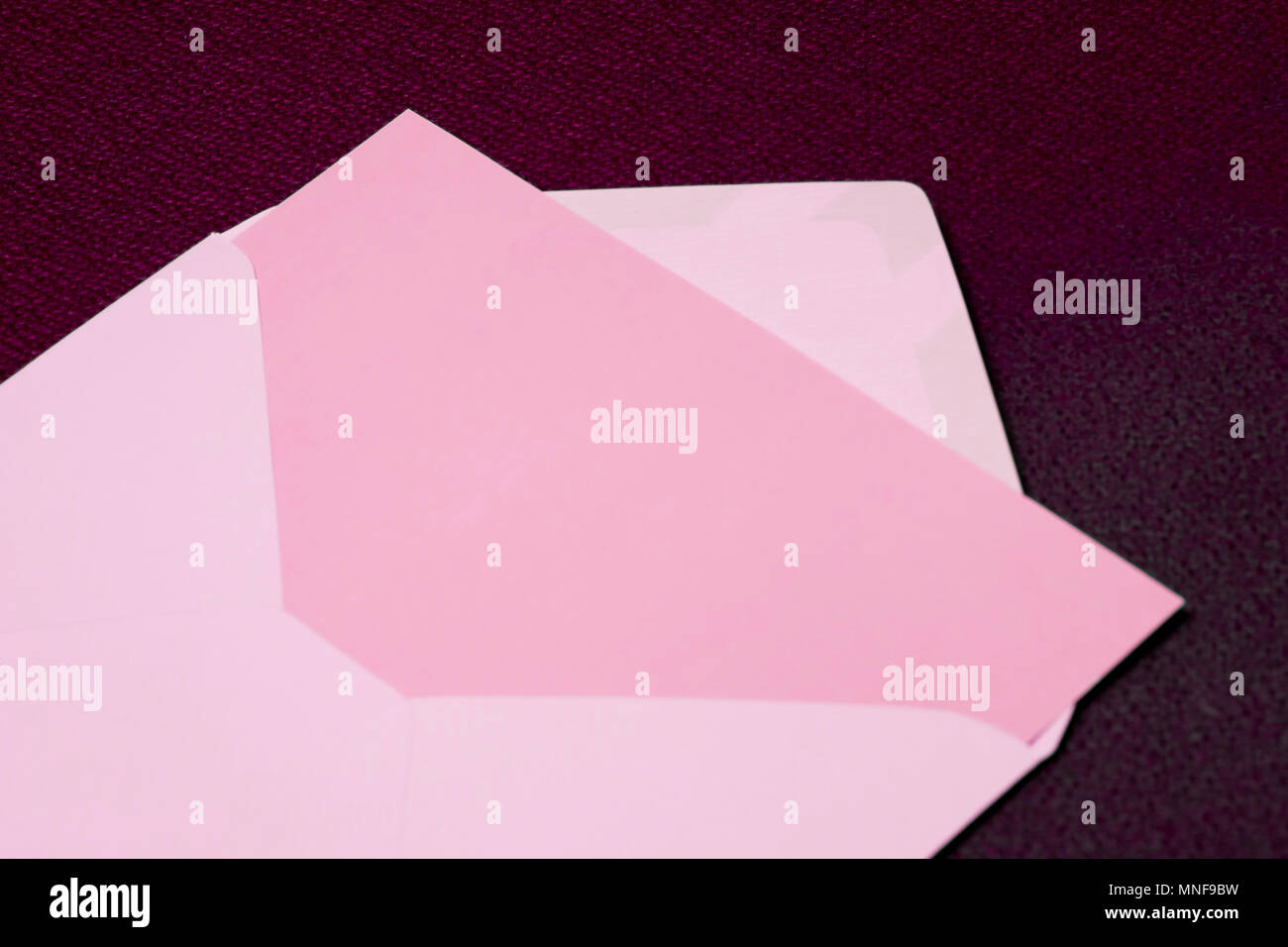 Blank pink card in opened pink envelope Stock Photo - Alamy