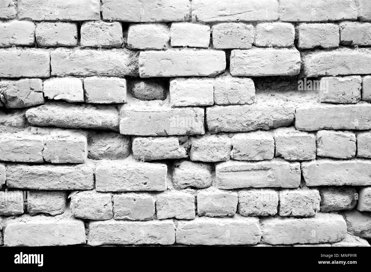 Tiled grunge cray brick wall texture for background. Monotone effect ...