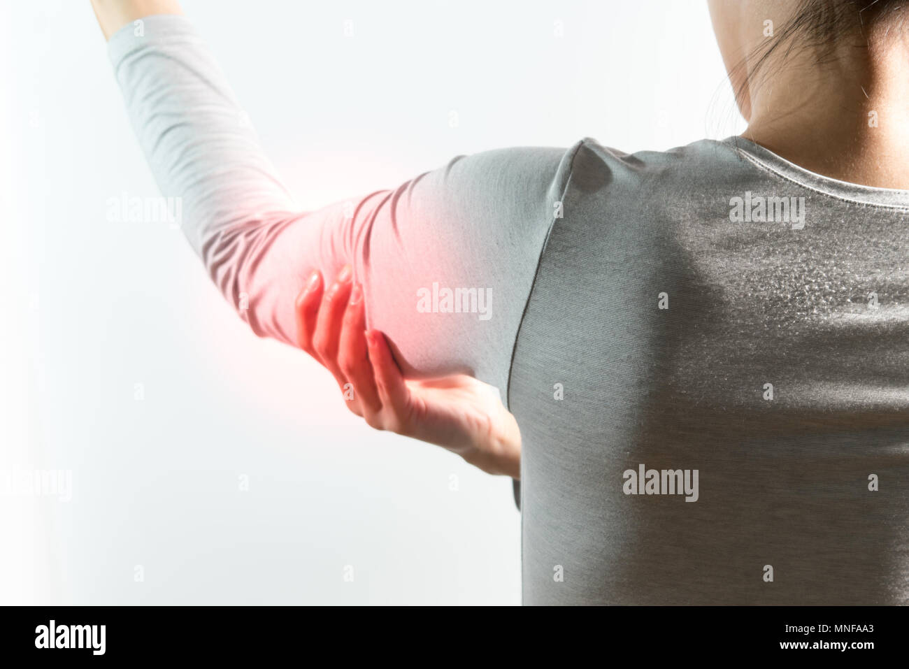 the women suffer from arm triceps injury/painful after workout Stock ...