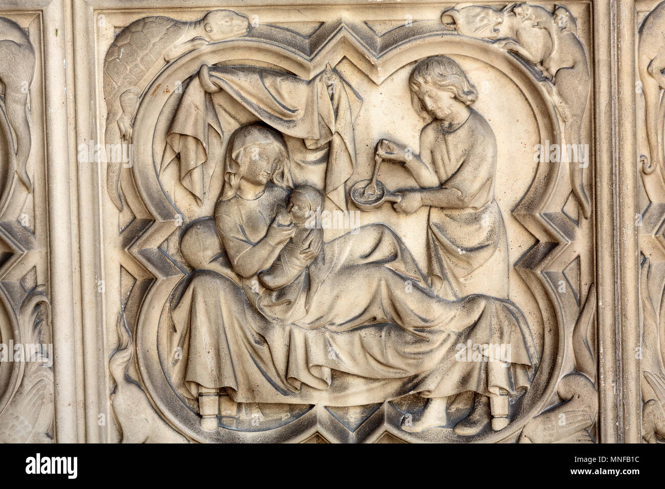 Paris - the Sainte-Chapelle (Holy Chapel).The base of the portal on ...